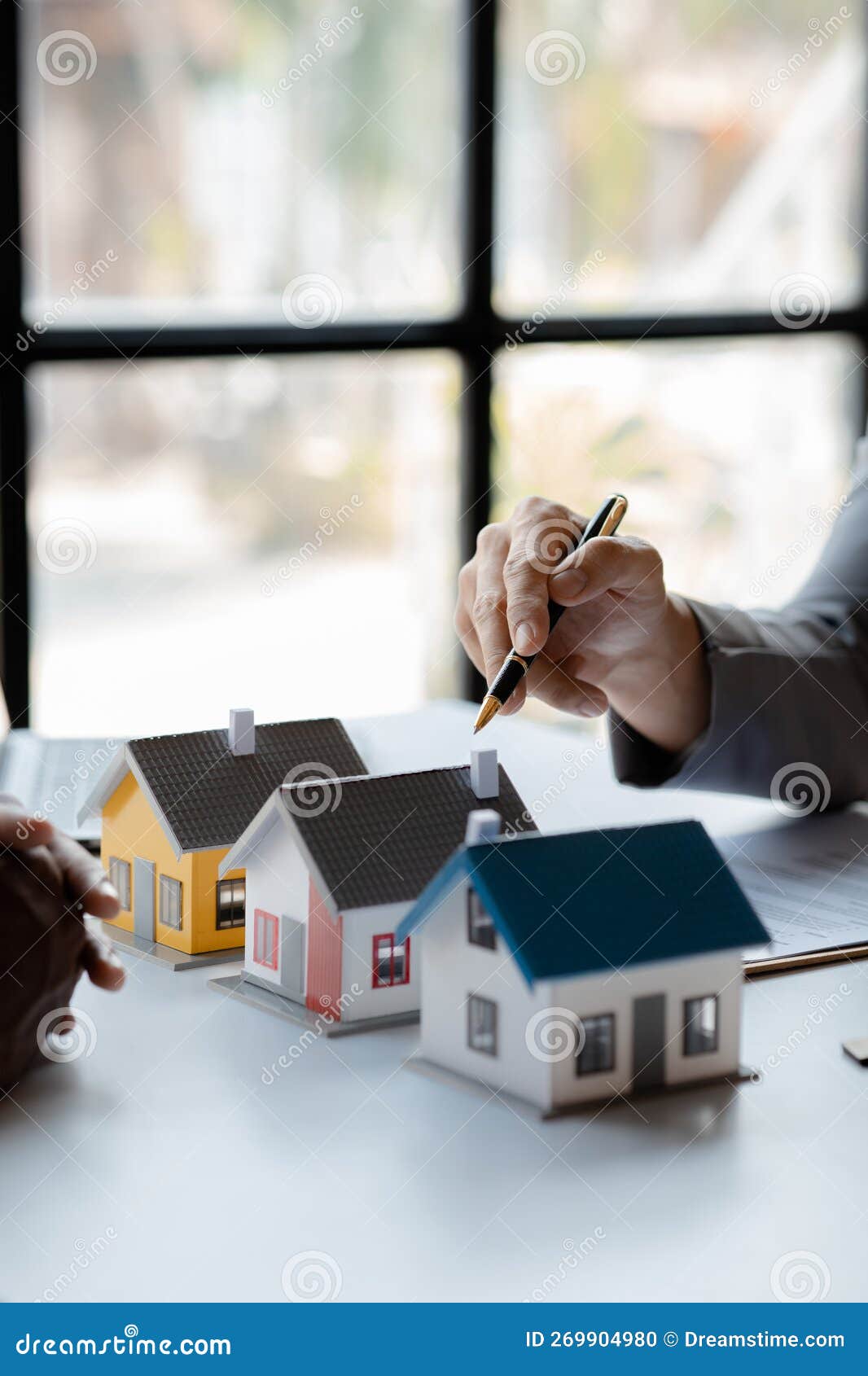 Real Estate Agents Explain Models of Housing Estates in Projects To ...