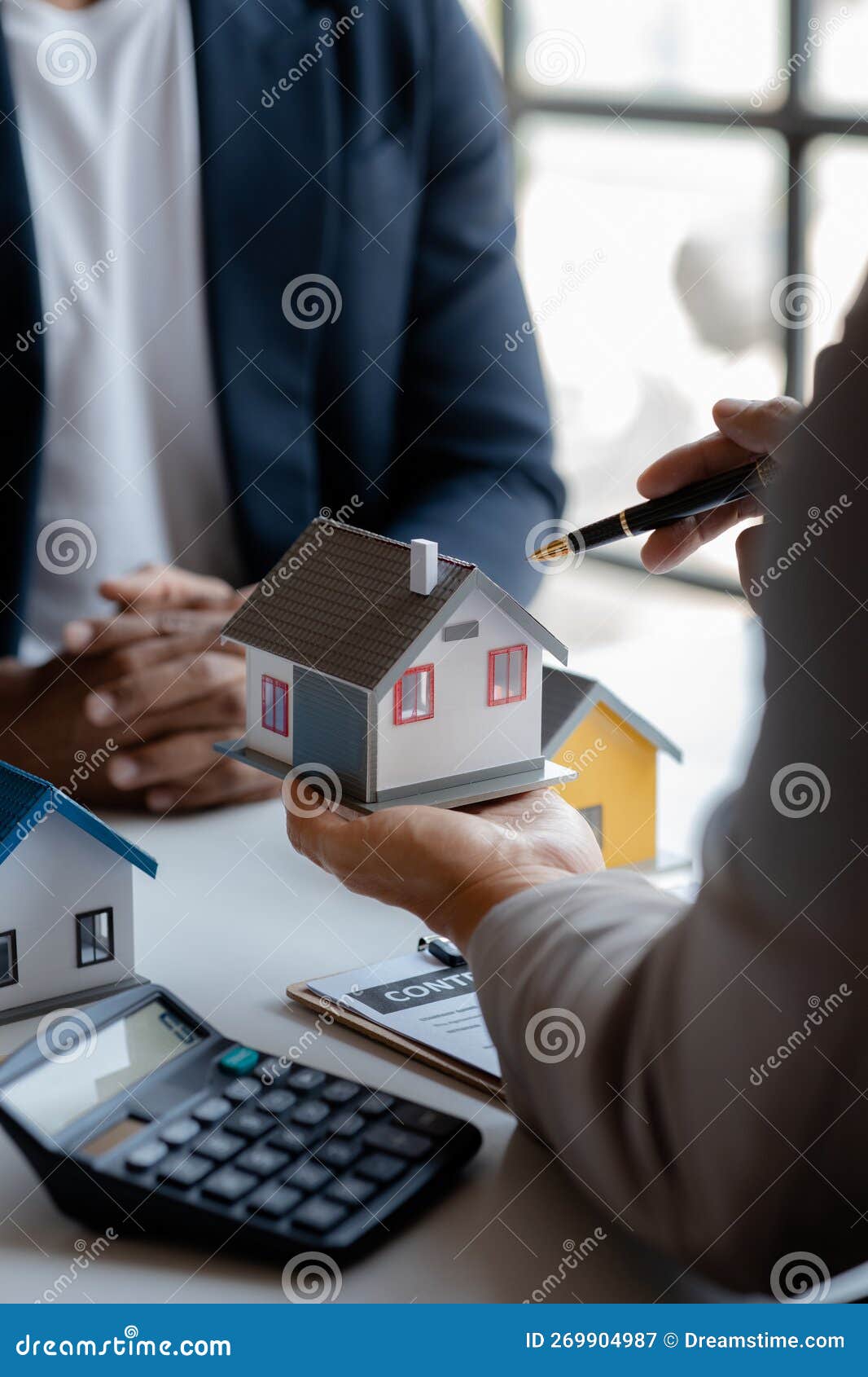 Real Estate Agents Explain Models of Housing Estates in Projects To ...