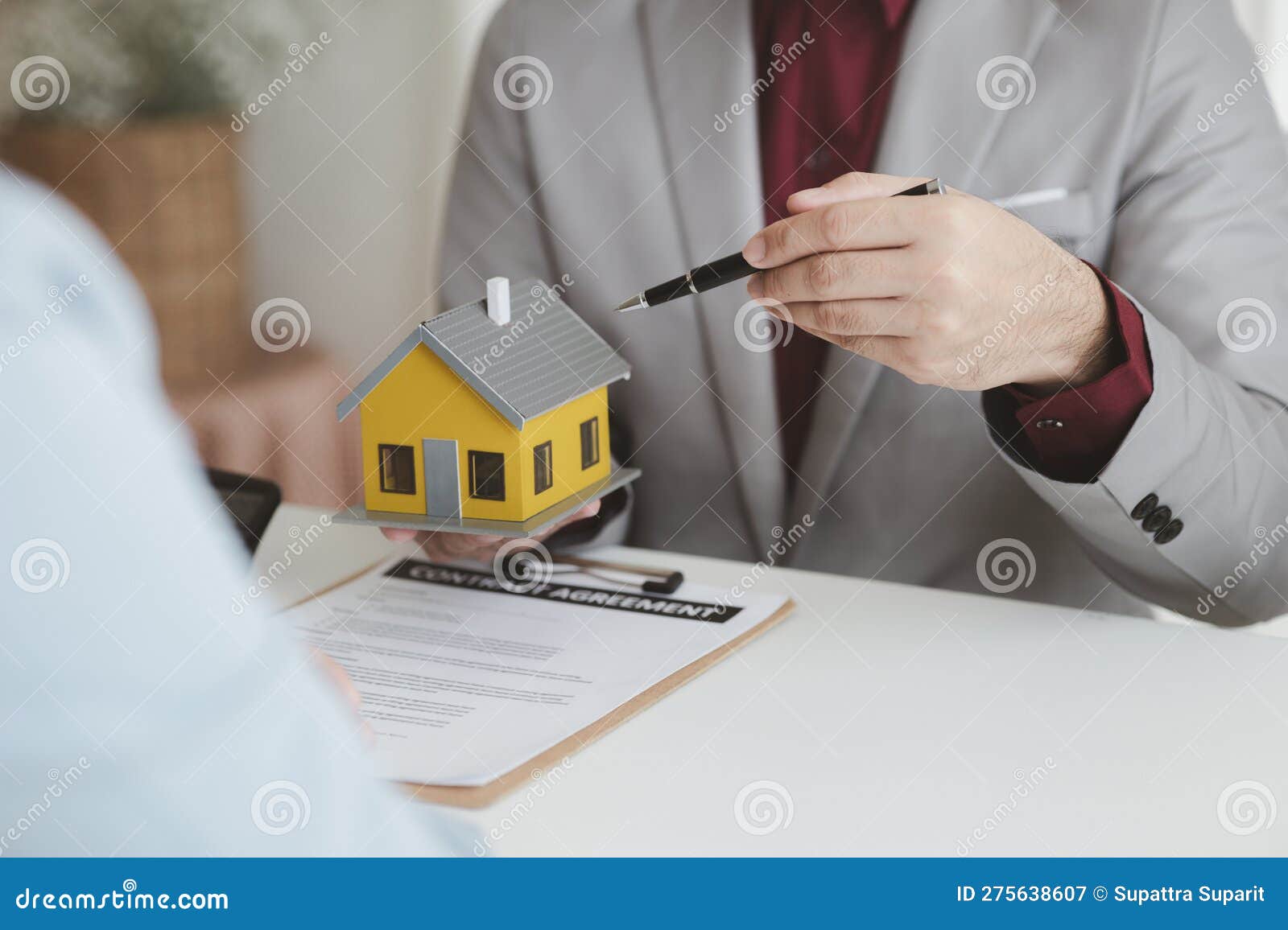 Real Estate Agents Explain Models of Housing Estates in Projects To ...