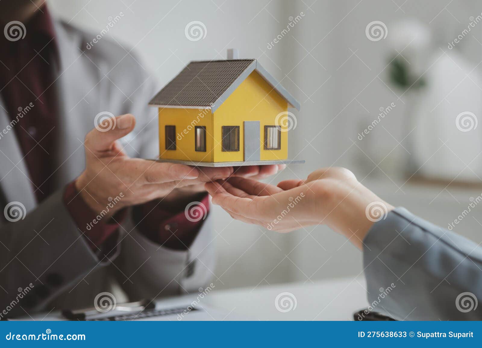 Real Estate Agents Explain Models of Housing Estates in Projects To ...