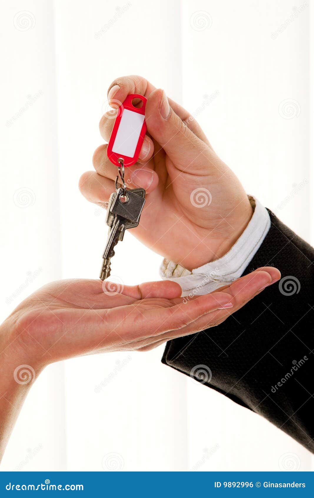 Real Estate Broker with a House Key Stock Photo - Image of keychain ...