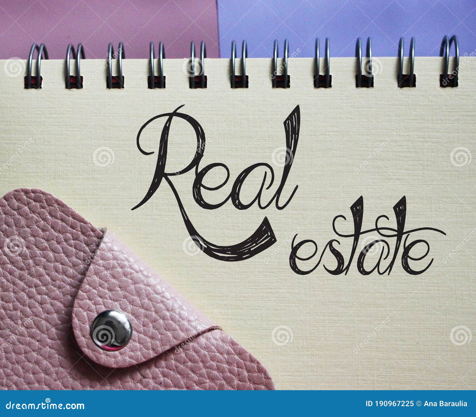 Real Estate Concept. Notepad with Wallet and Real Estate Words Message ...