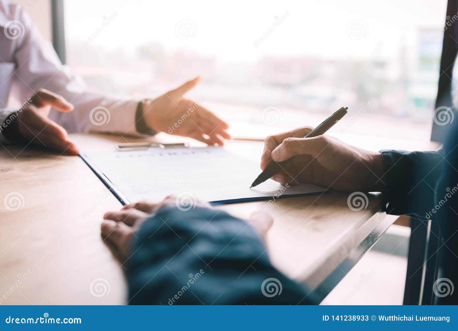 Real Estate Contract on Desk with Client Signing in Office Stock Image ...