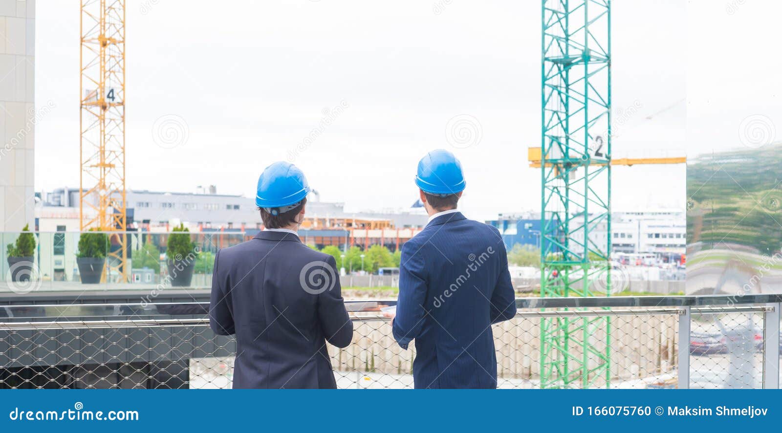 Real Estate Developers in Helmets. New Office Construction Stock Photo ...