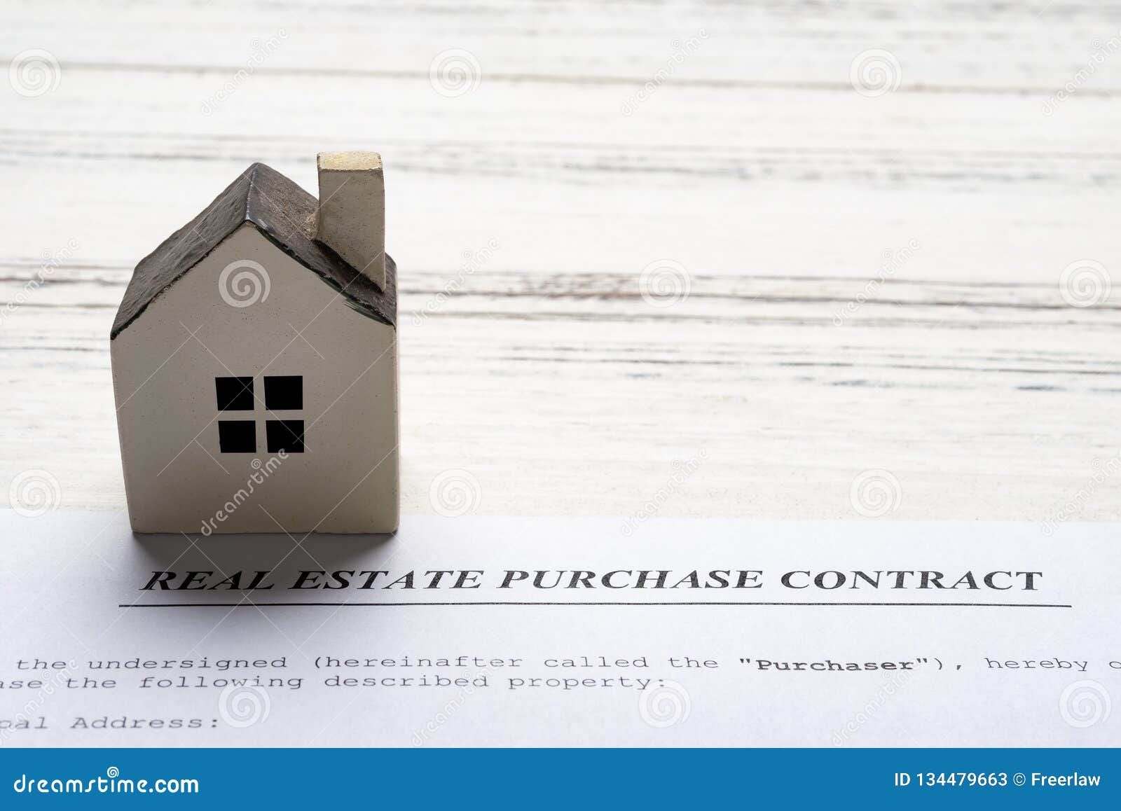 Real Estate Purchase Contact with an Architectural Model Stock Image ...