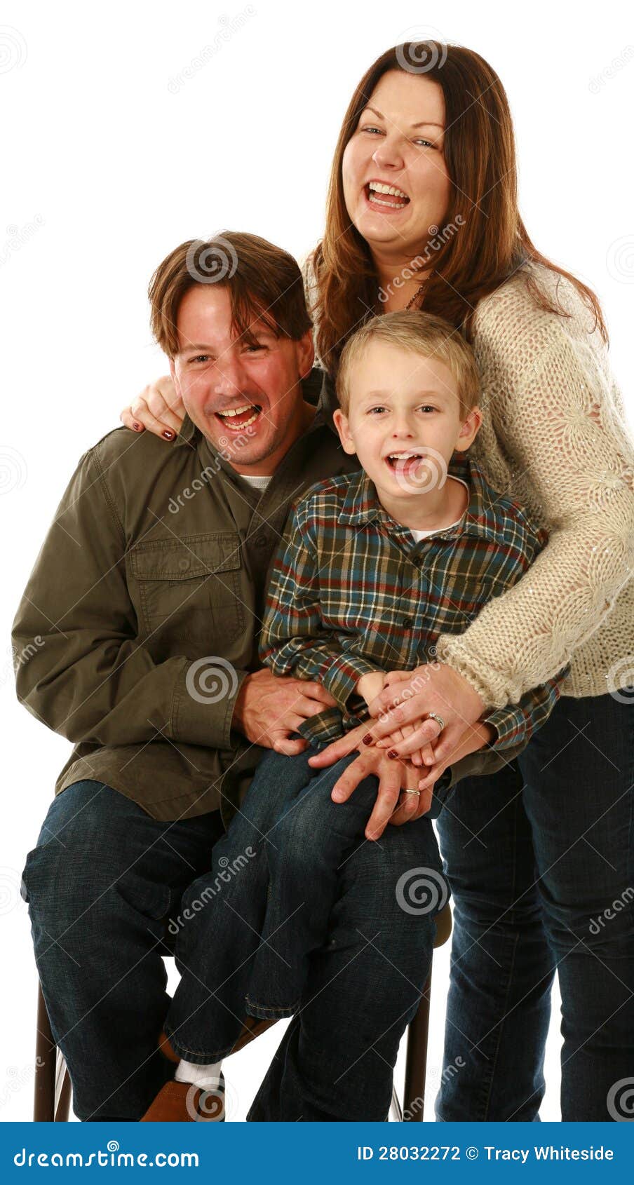 Real family with laughing stock photo. Image of parents - 28032272