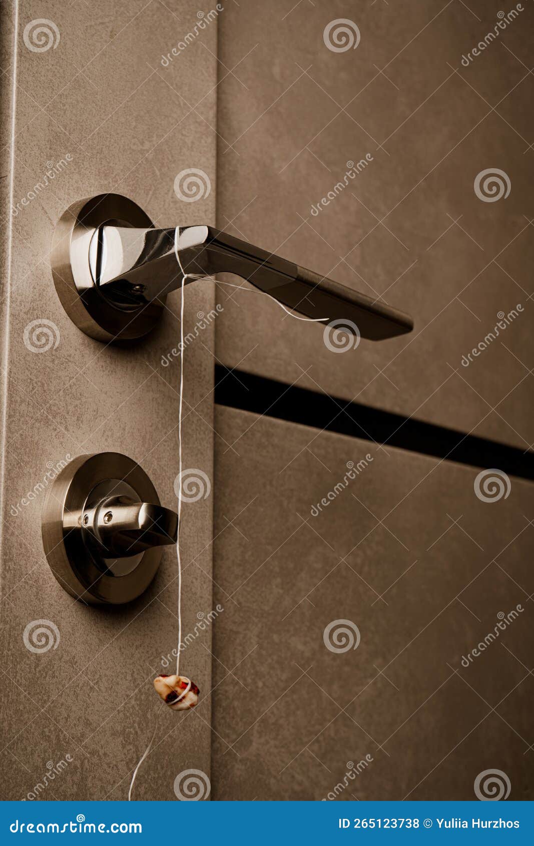 Real Human Teeth Hanging on the Door Handle. Pulled Out Tooth ...