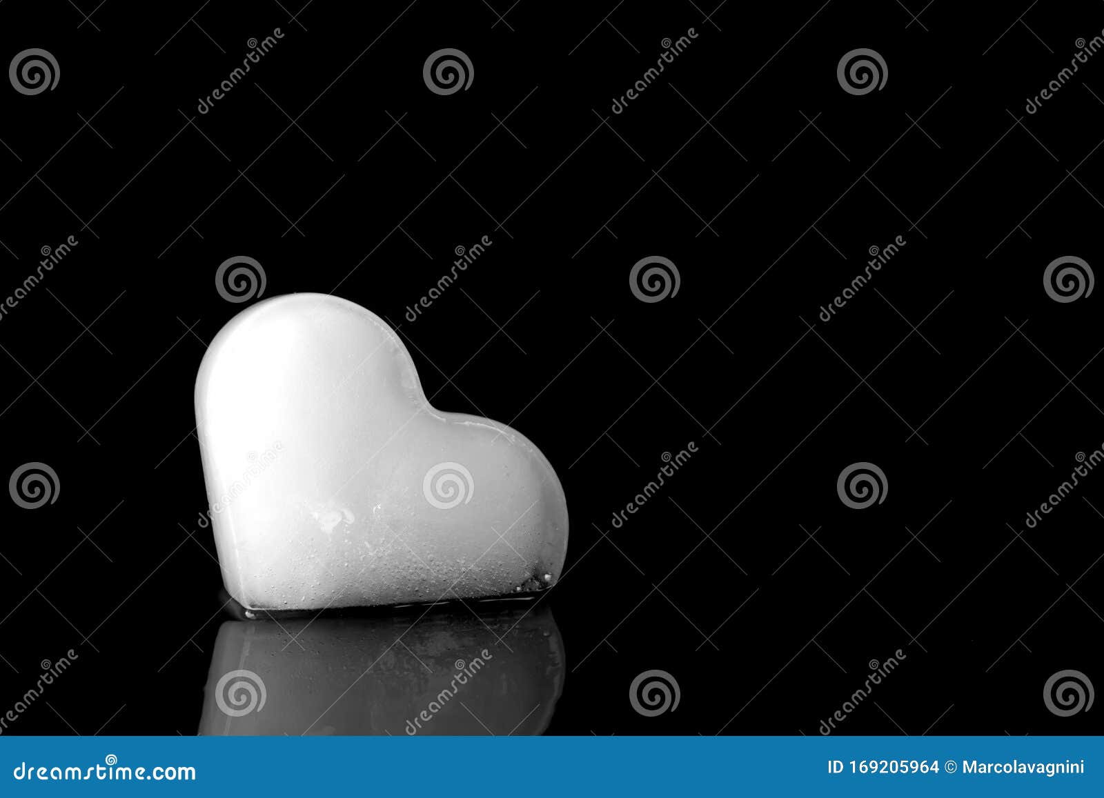 Real Ice Heart on a Dark Surface Stock Photo - Image of celebration ...