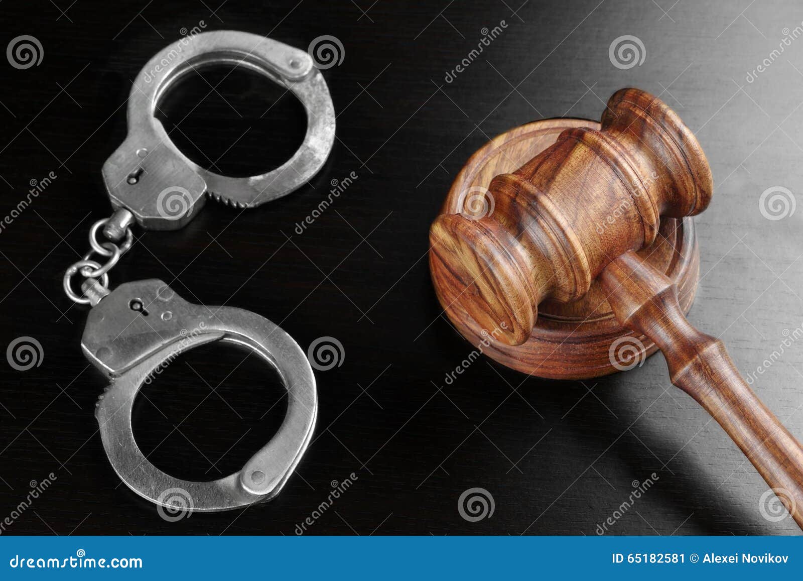 Real Judges Gavel and Handcuffs on the Black Table Stock Image - Image ...