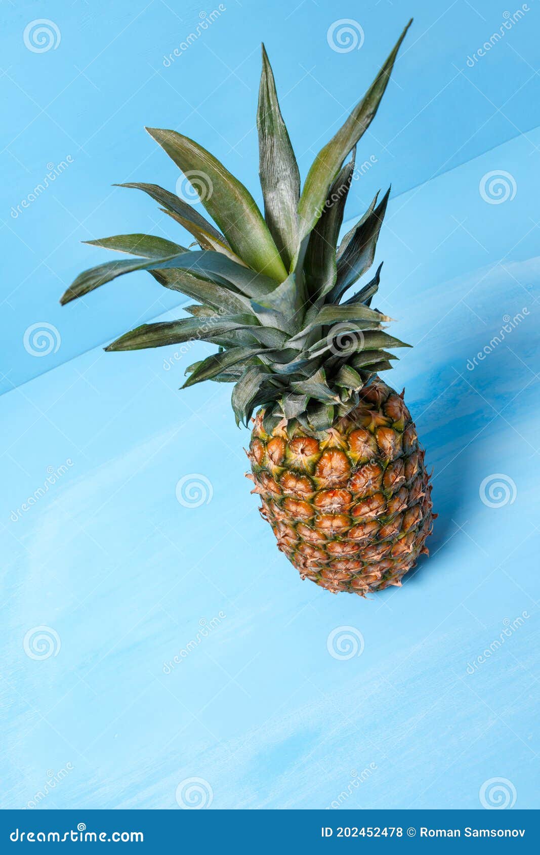 The Real Pineapple on a Blue Wooden Background Stock Photo - Image of ...
