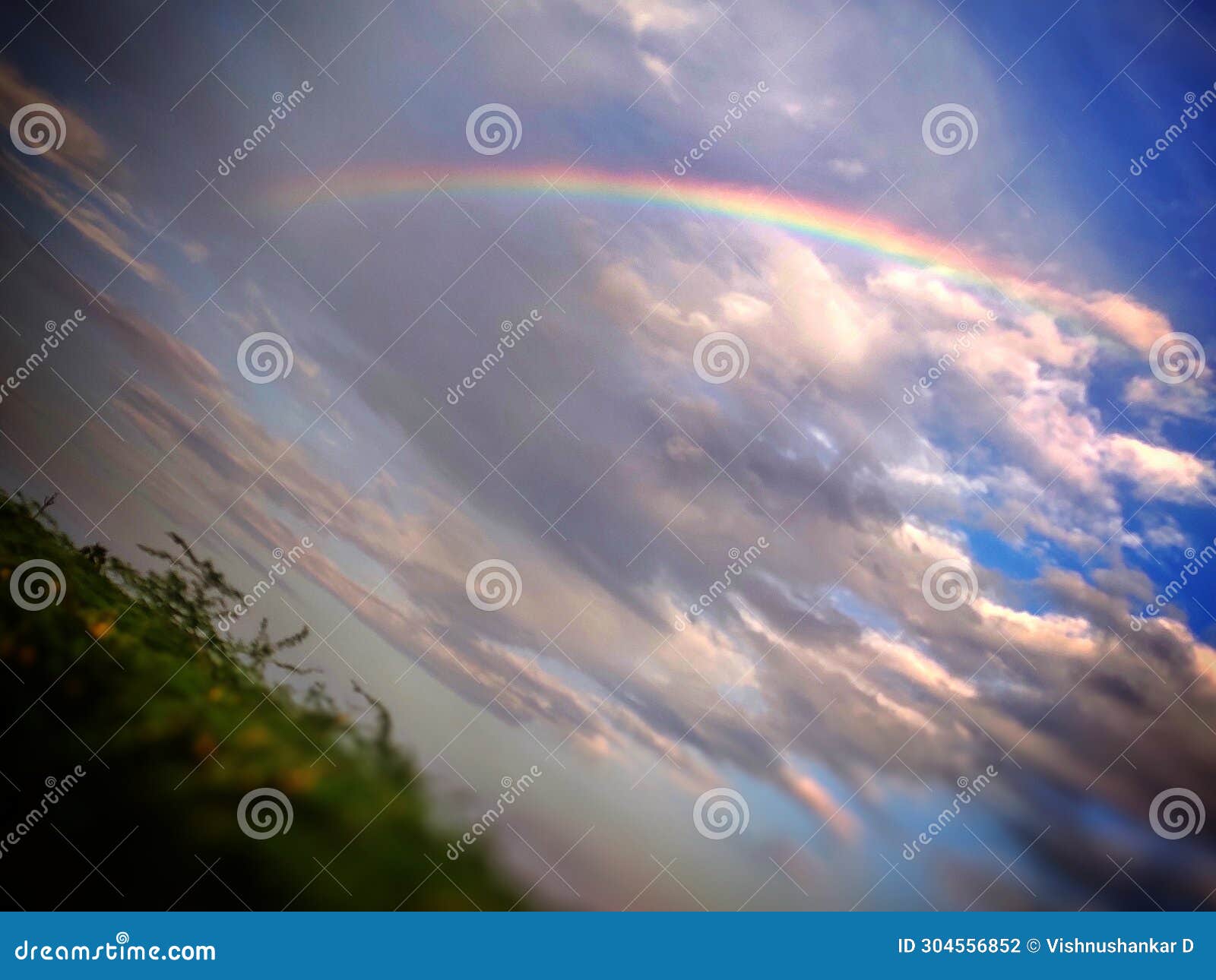 Real Rainbow with Clouds Captured on Rainyday in Mobile Stock Photo ...