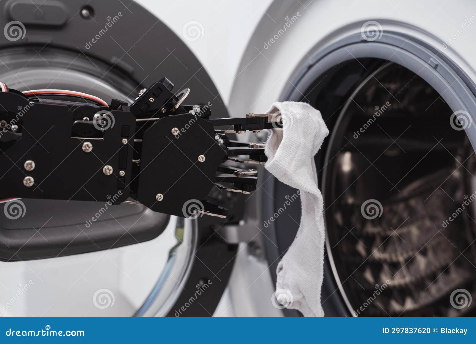 Real Robot S Hand and Washing Machine. Concept of Artificial ...