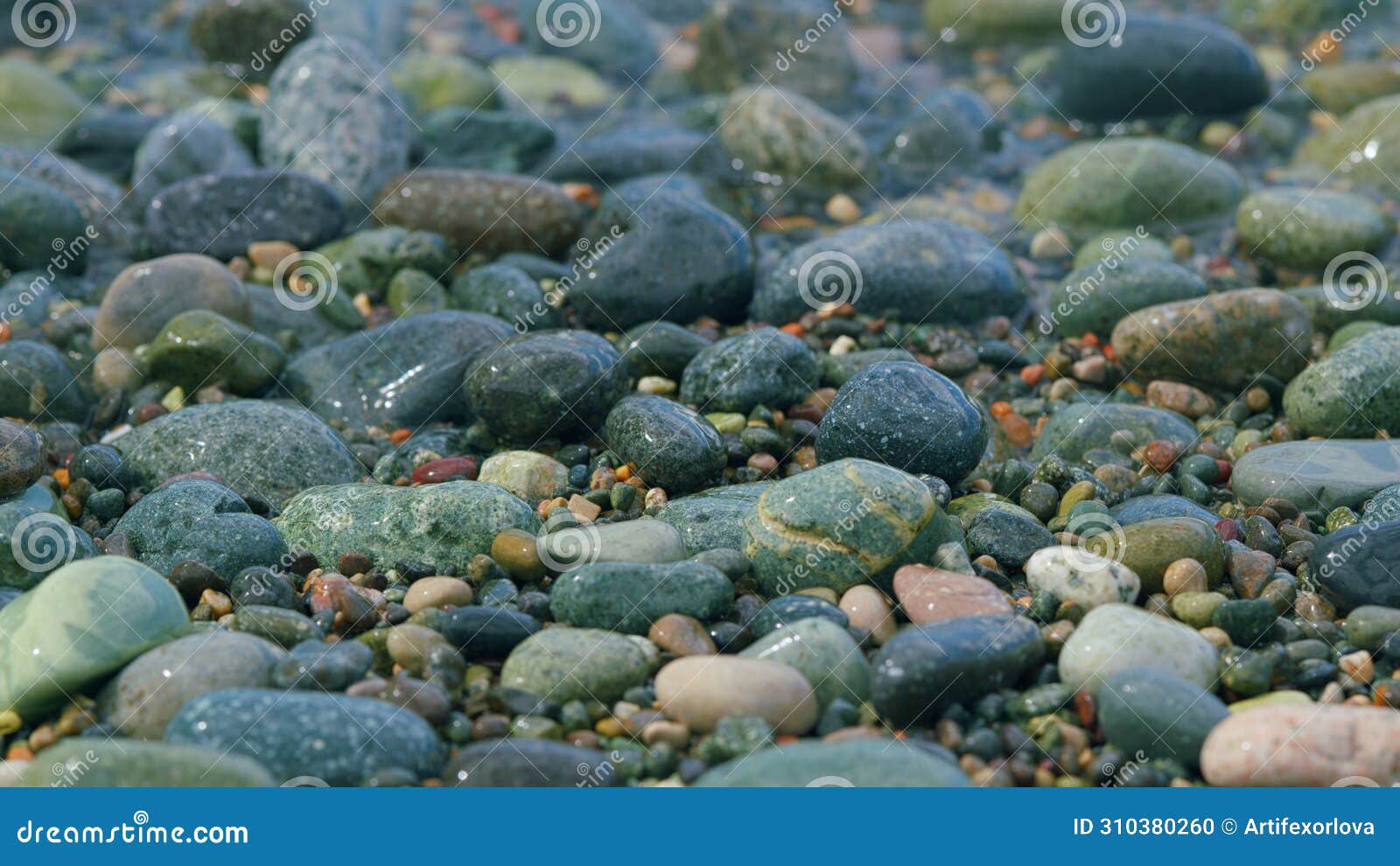 Pebbles Under the Surface of the Water. Natural Background. Waves and ...