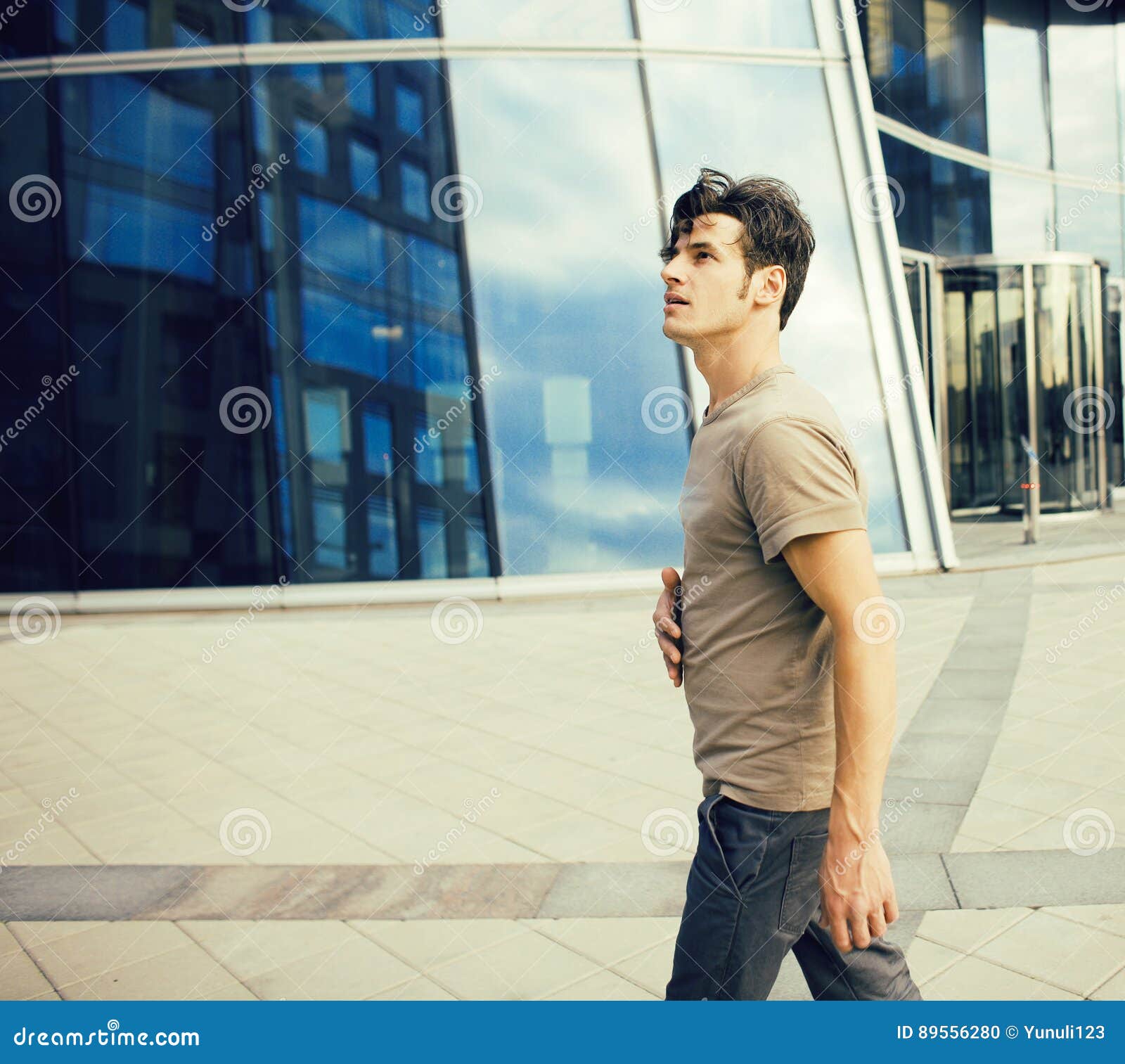 Real Young Man Stand in Front of Modern Business Building Stock Photo ...