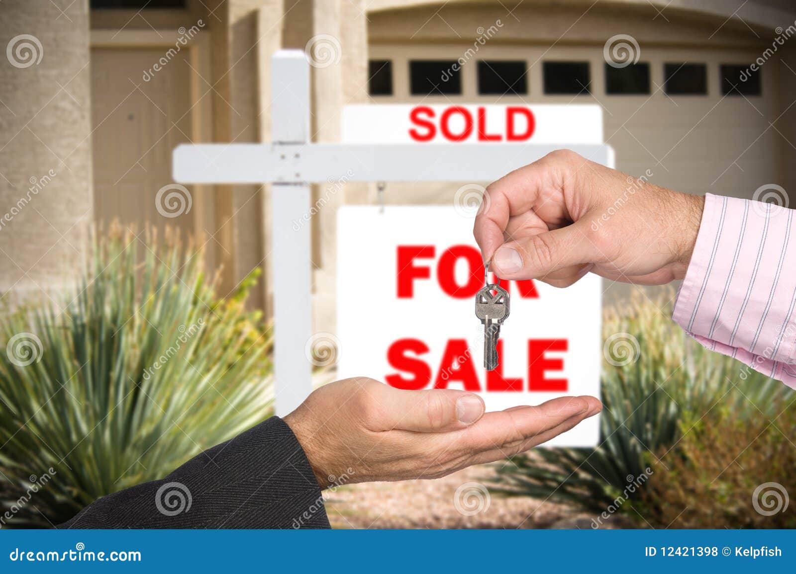 Realator handing over keys stock photo. Image of future - 12421398
