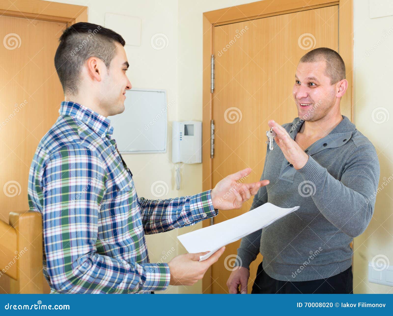 Realtor Giving Keys To Flat Owner Stock Photo - Image of buying ...