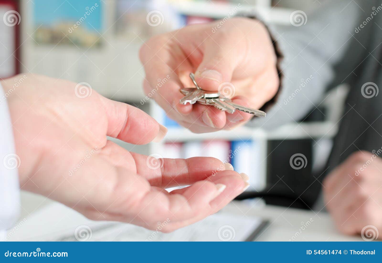 Realtor Handing the Keys To His Client Stock Photo - Image of female ...