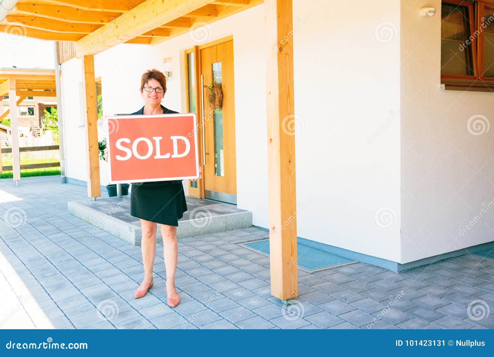 Realtor Selling a House stock image. Image of female - 101423131