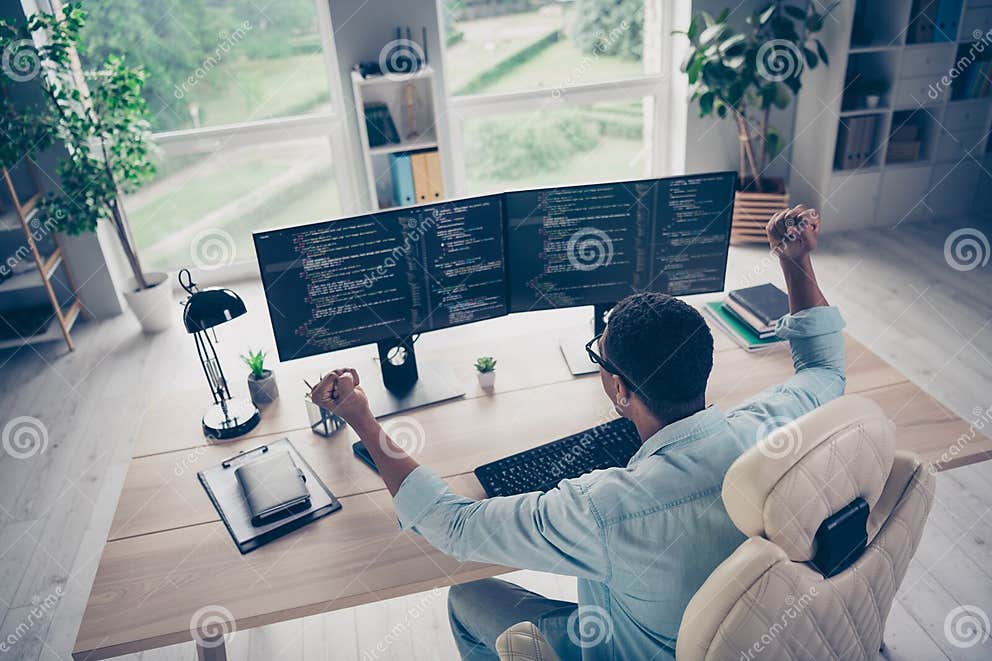 Rear Back View of Lucky Happy Programmer Celebrating Rising Fists Up Successful it Startup Web ...