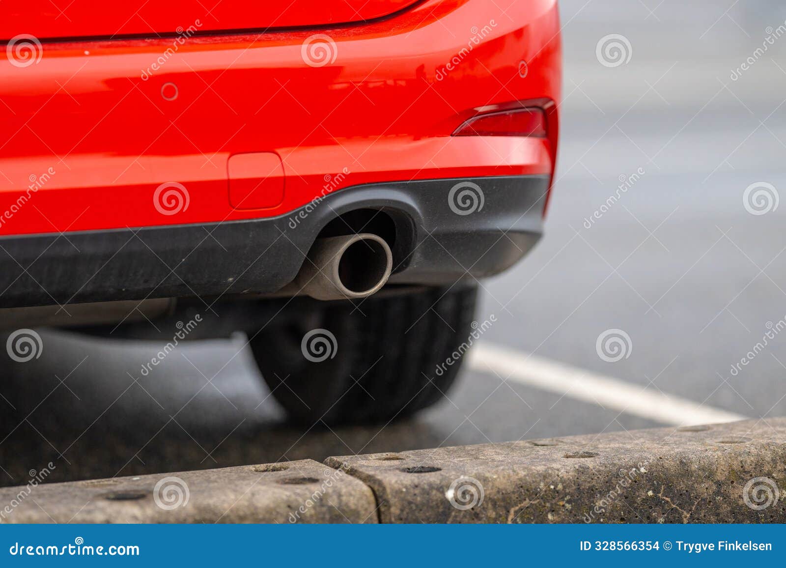 Rear bumper of a red car.. stock photo. Image of technology - 328566354