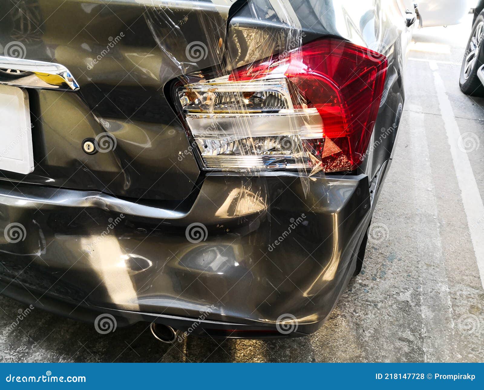 Rear of Car Damaged by Accident. Car Tail Light Has Broken from Crash ...