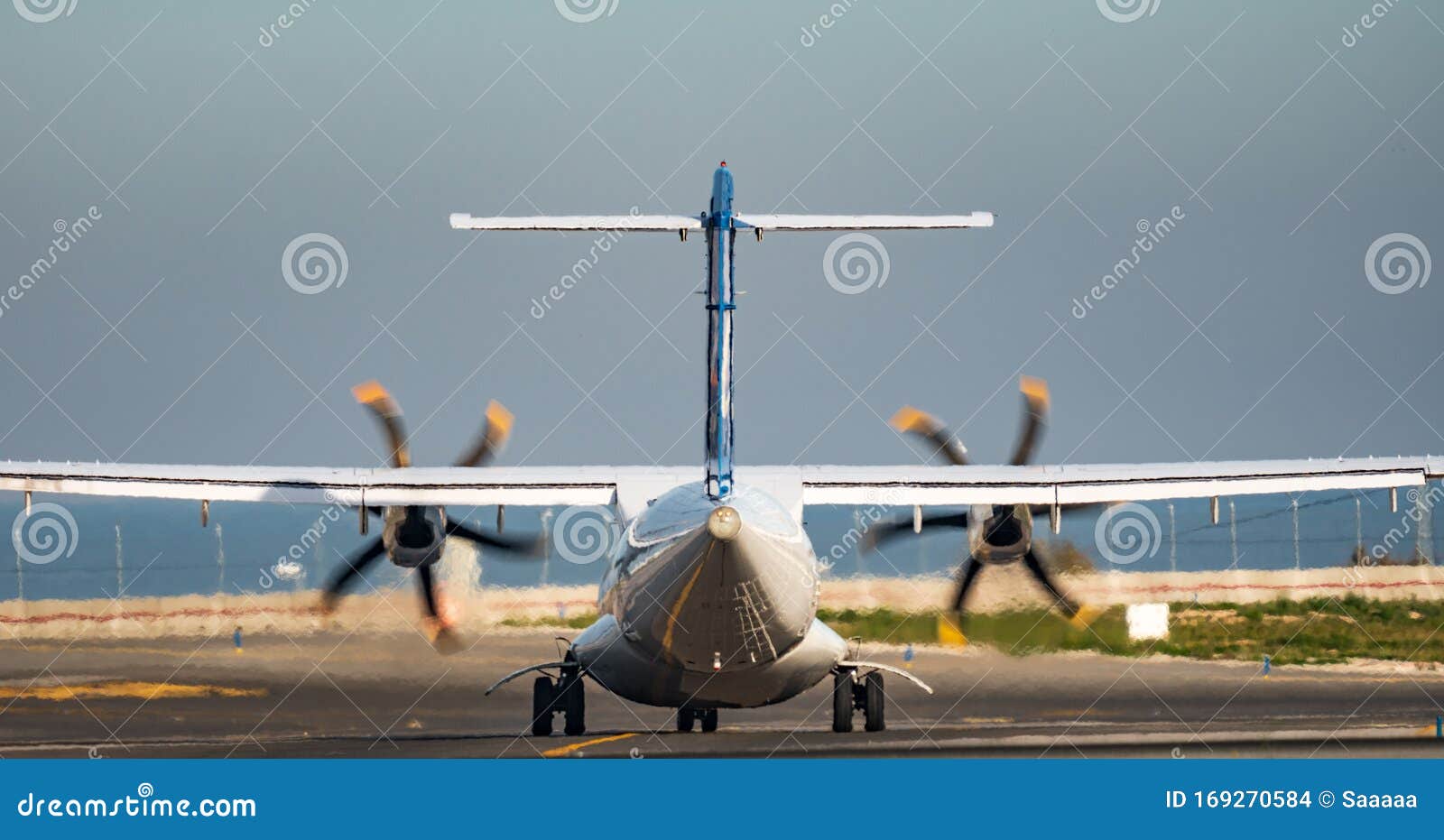 Rear View of Propeller Plane in the Runway Stock Photo - Image of ...