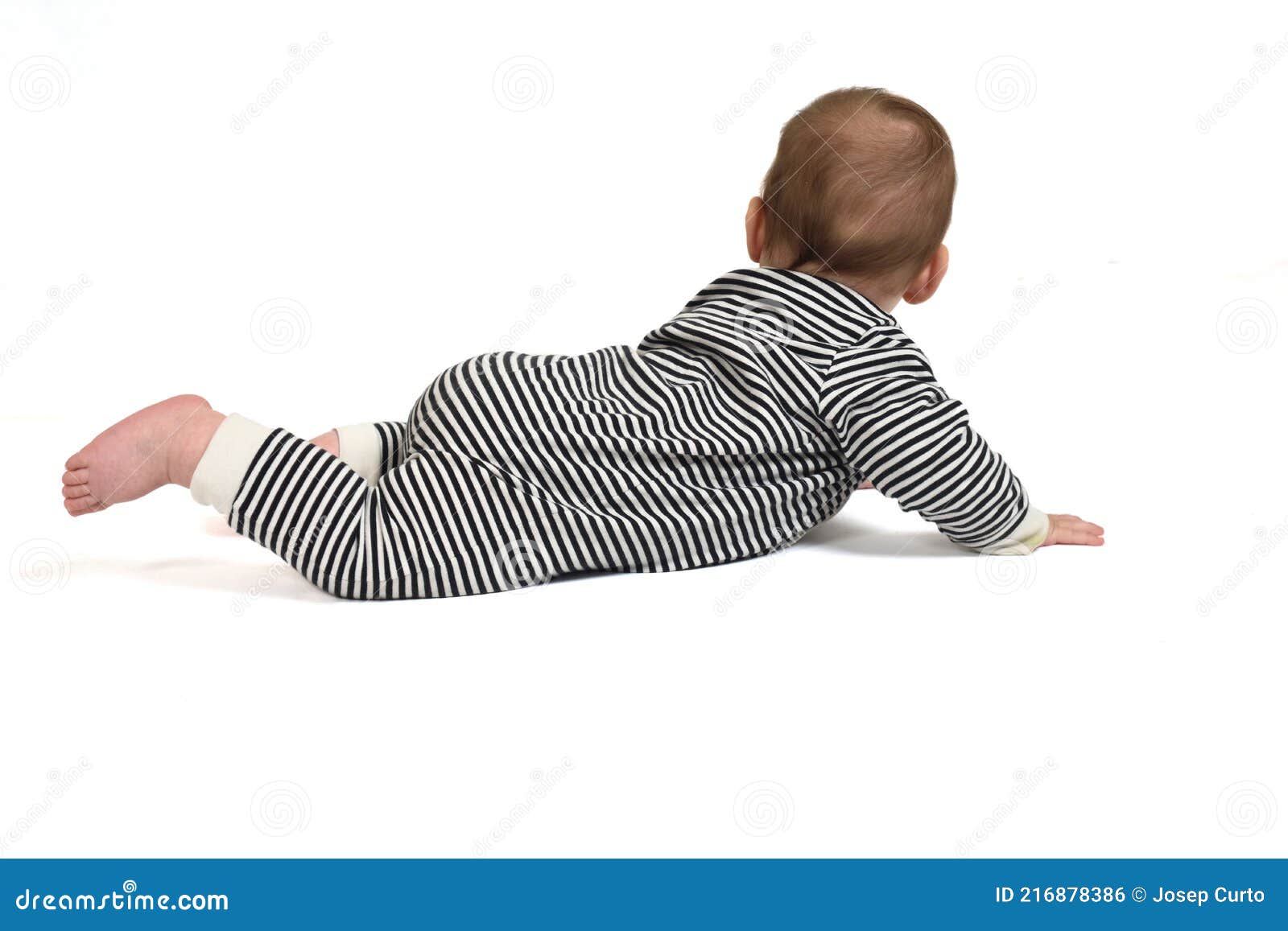 Baby crawling on the floor stock photo. Image of happy - 216878386