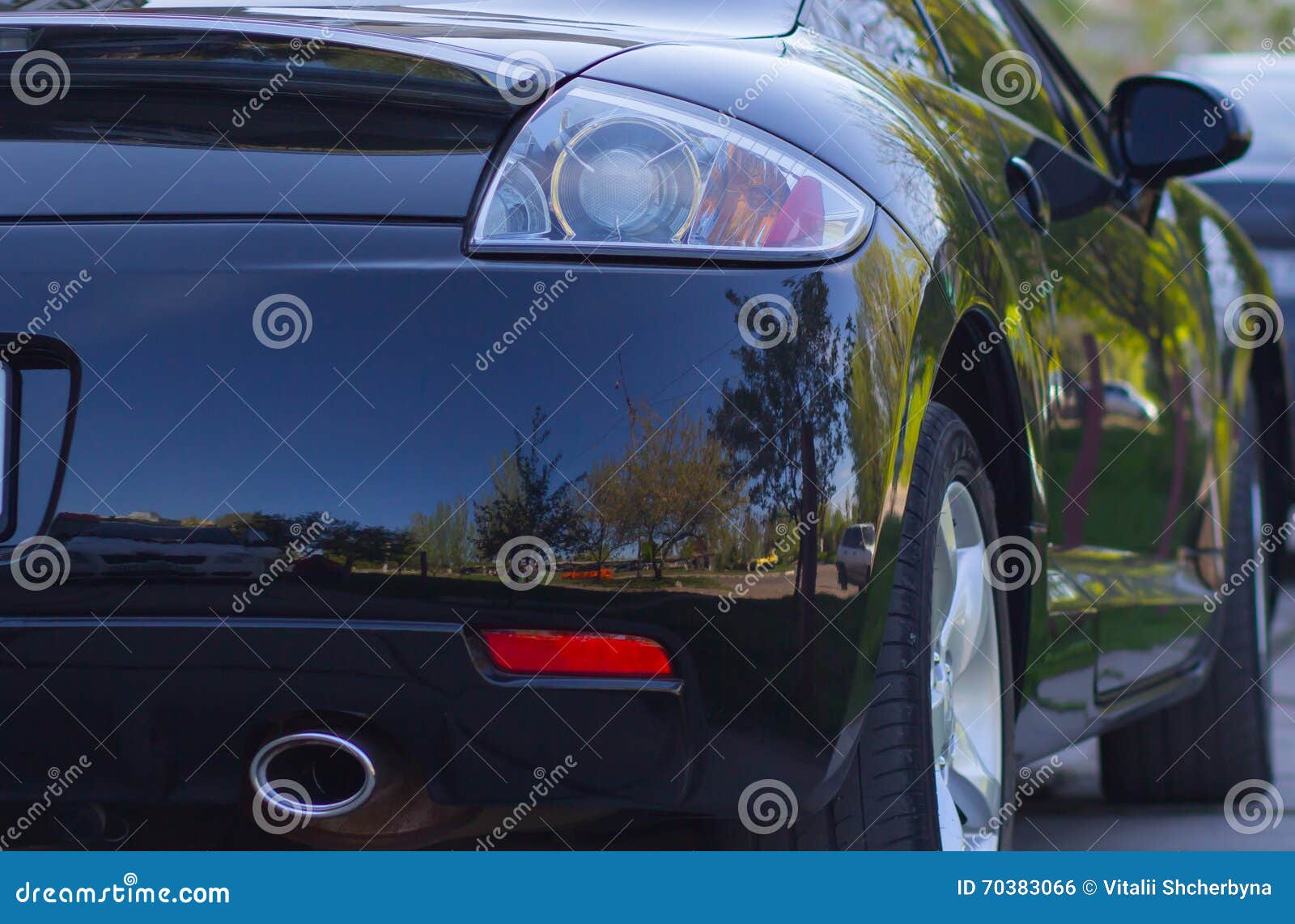 Rear-side View of a Luxury Car with Natural Reflection Nature Stock ...