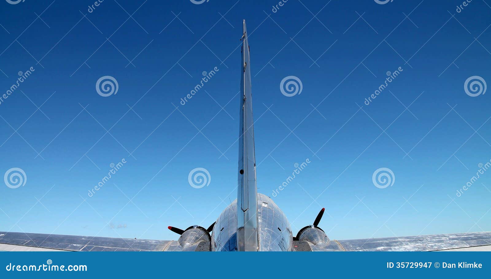 Rear View of Aircraft in Flight Stock Image - Image of closeup, winged ...