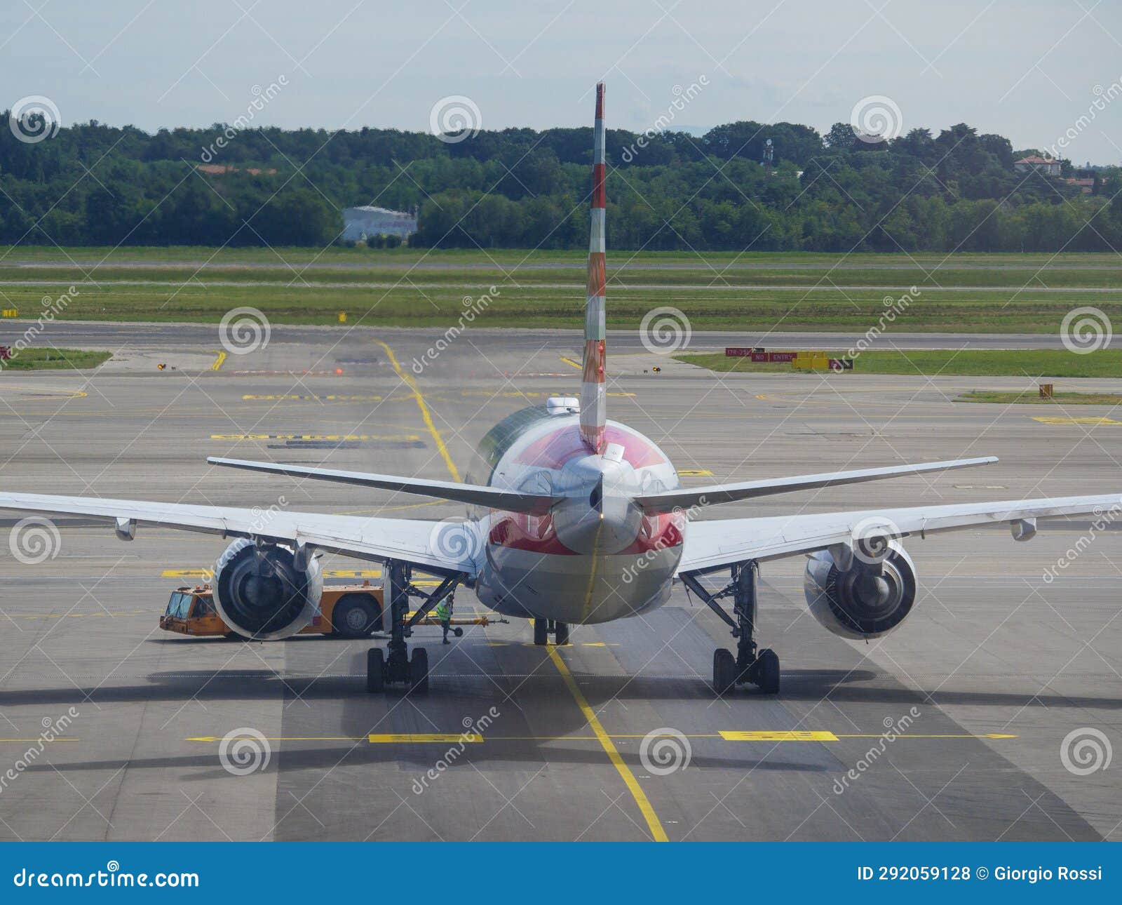 Rear View of an Airplane in Motion on the Runway Stock Photo - Image of ...