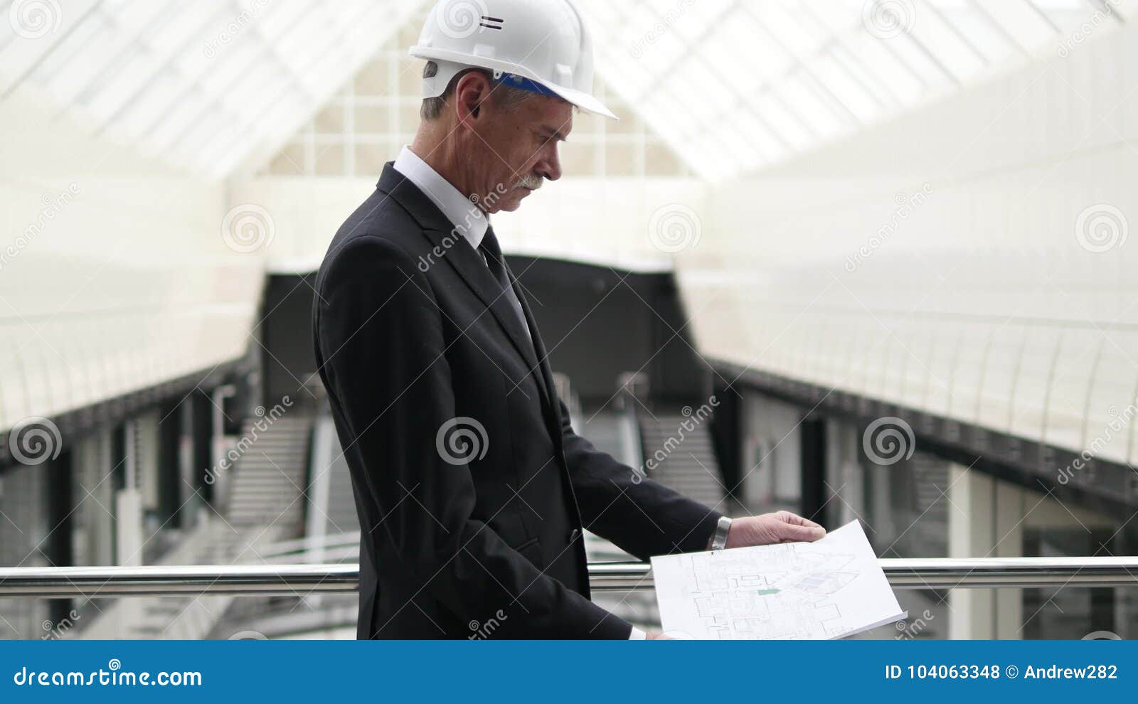 Rear View of Architect Looking Comparing Housing Project with Building ...