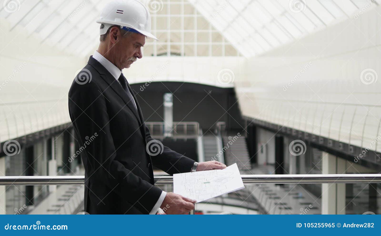 Rear View of Architect Looking Comparing Housing Project with Building ...