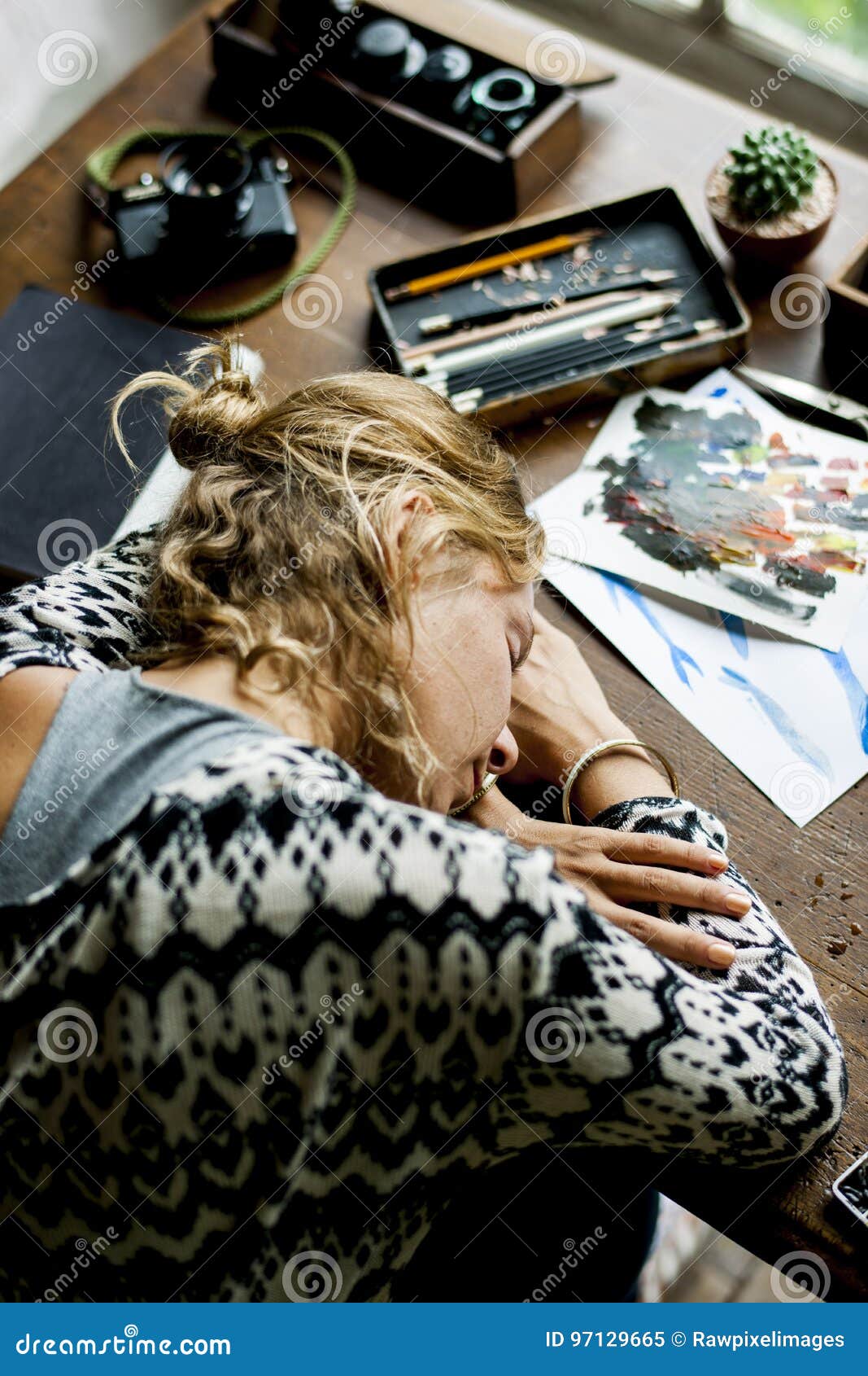 Rear View of Artist Woman Taking a Nap on Work Table Stock Image ...