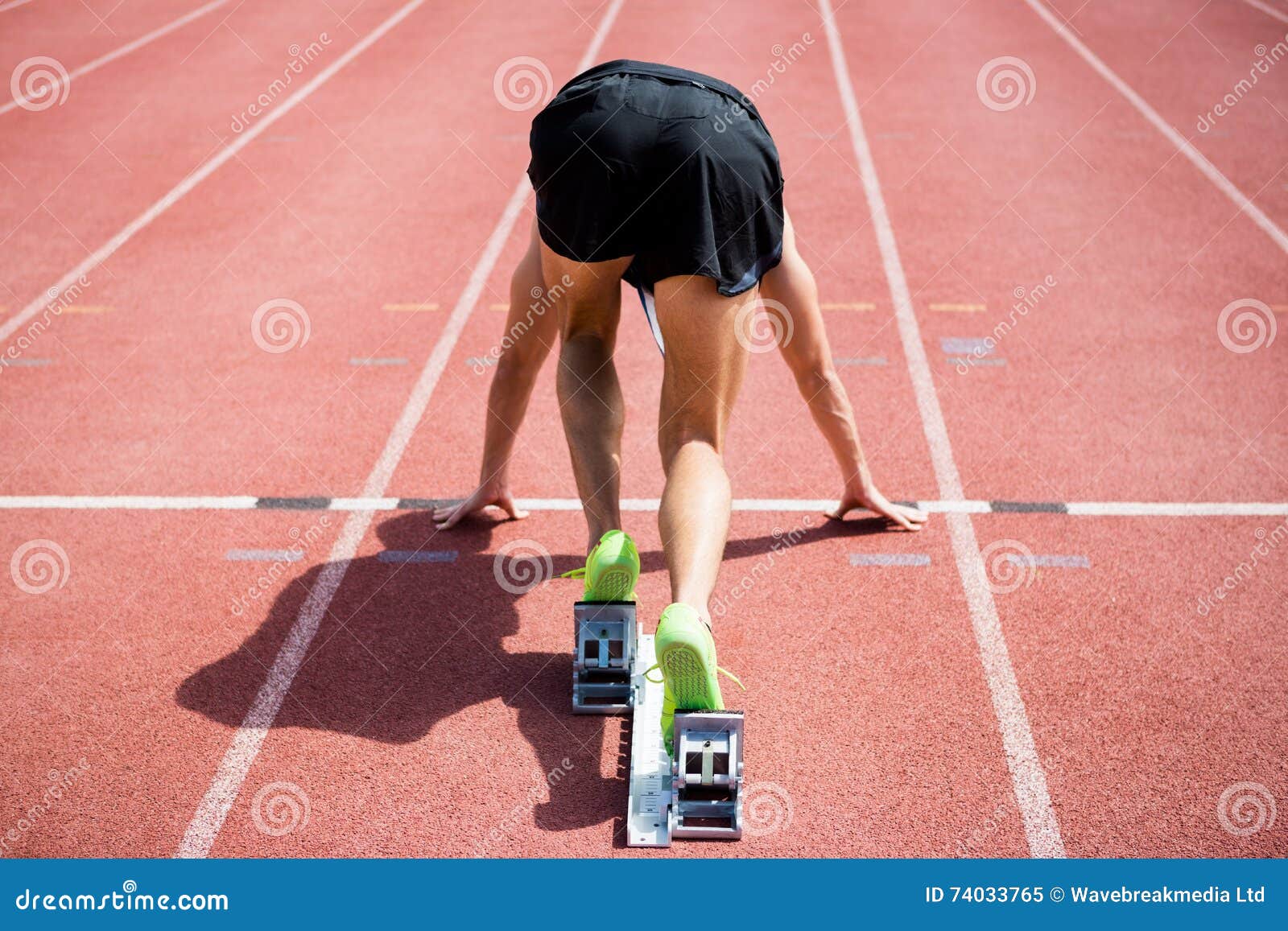 Rear View of an Athlete Ready To Run Stock Image - Image of ready ...