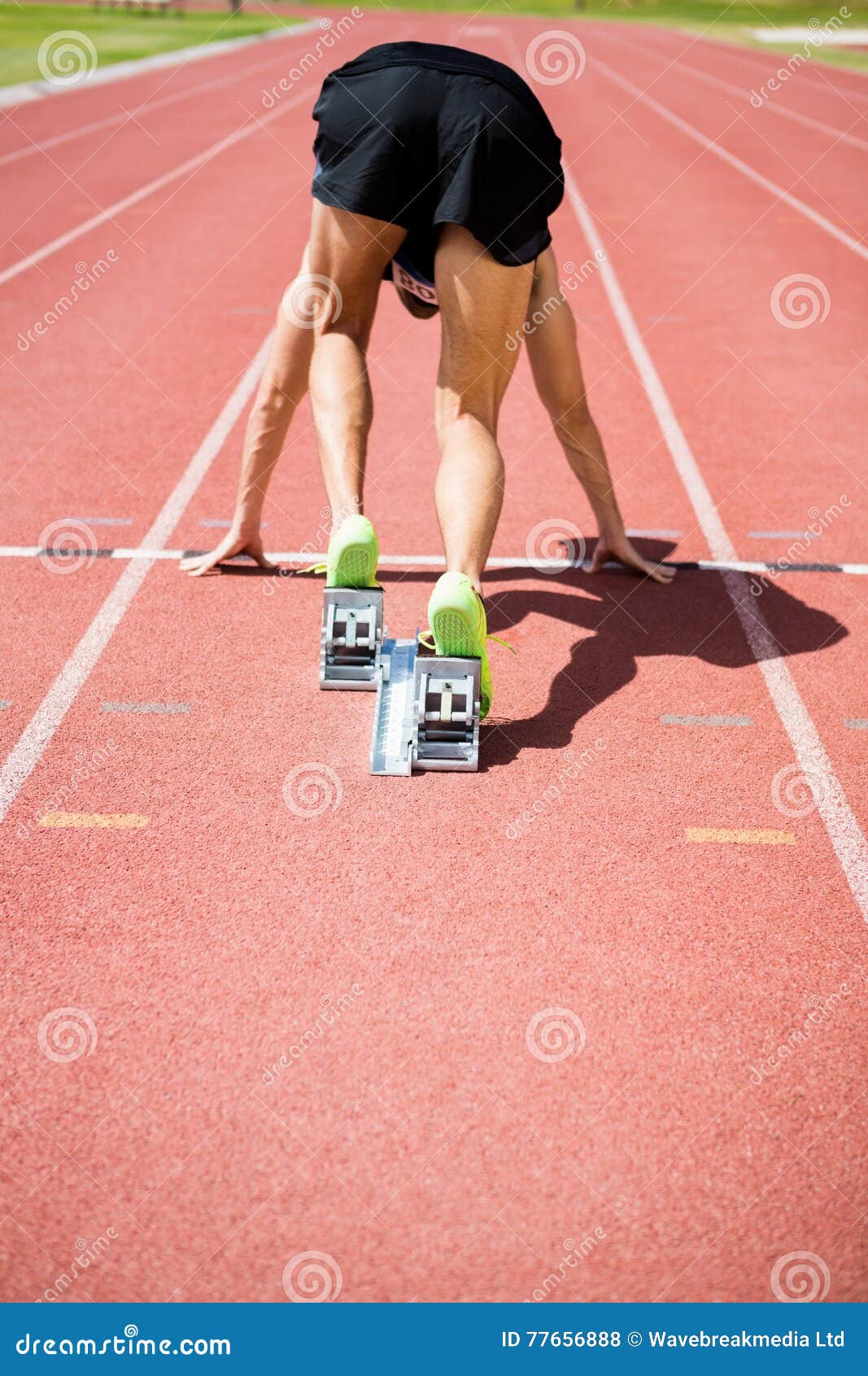 Rear View of an Athlete Ready To Run Stock Photo - Image of sportswear ...