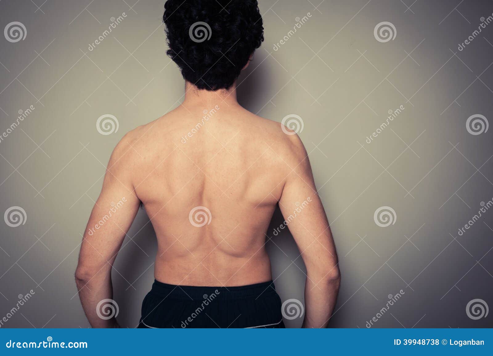 Rear View of Athletic Young Man Stock Photo - Image of muscle, exercise ...