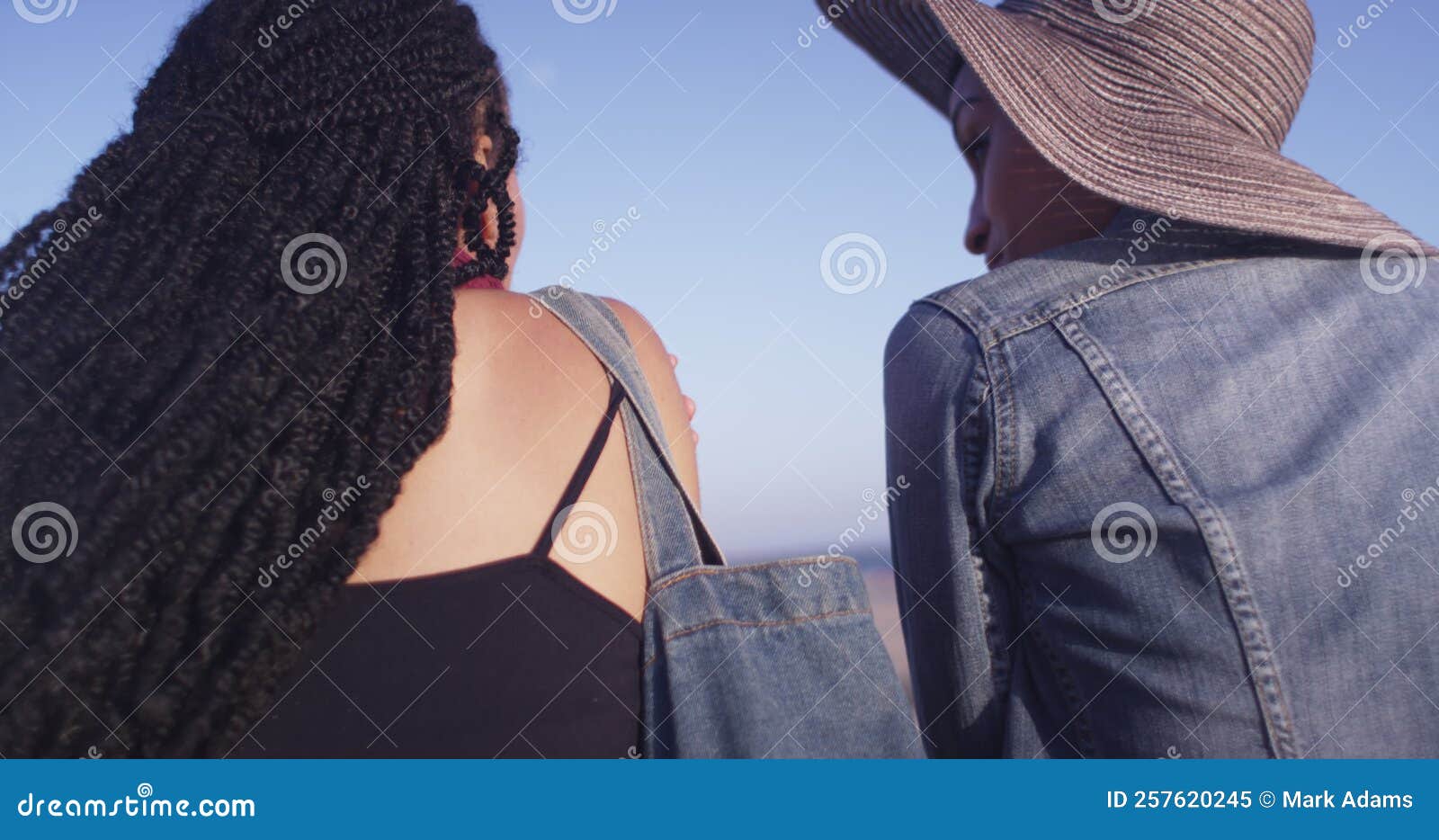 Rear View of Best Friends Looking Out and Talking on Pier Stock Video ...