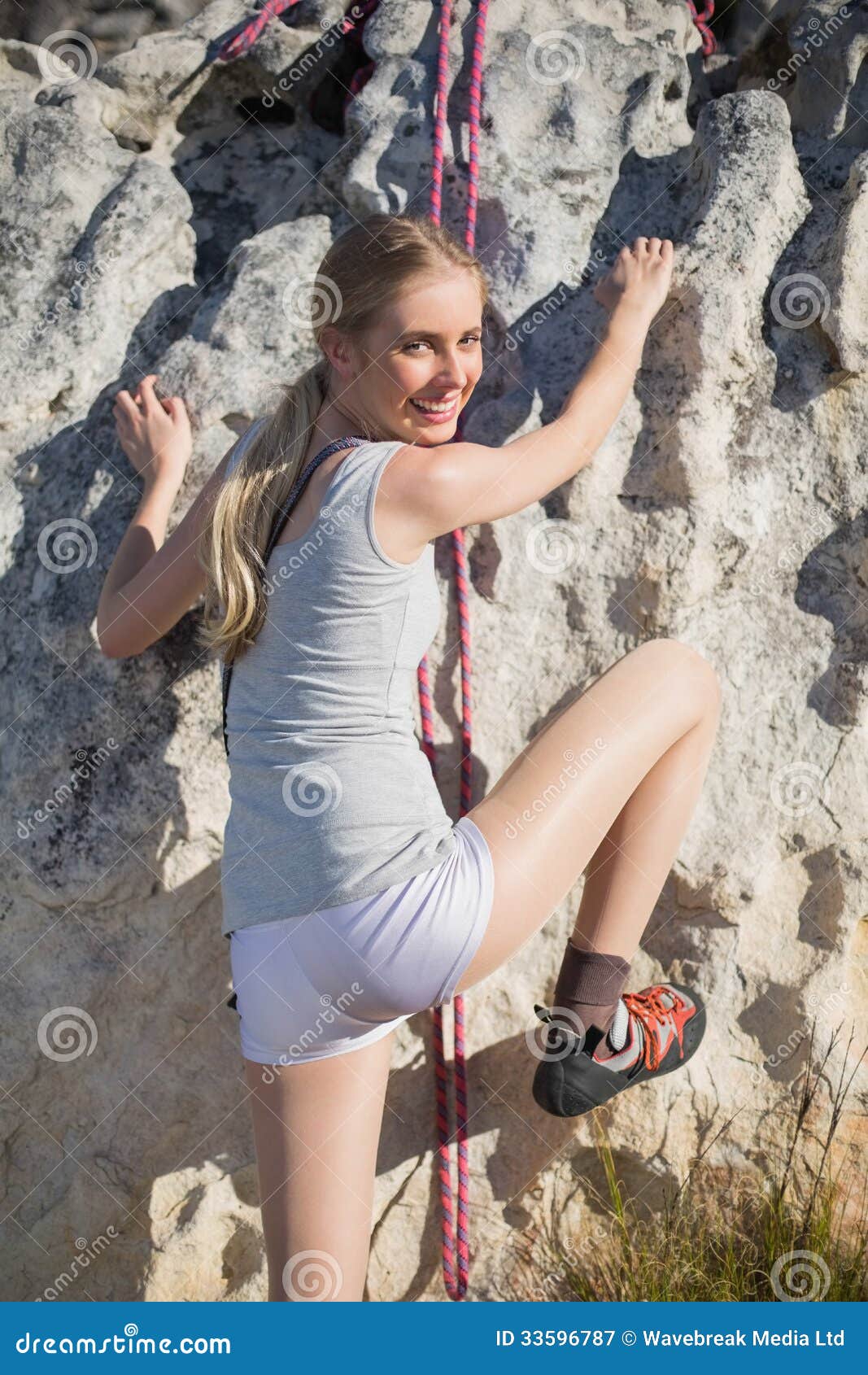 Rear View of Blonde Woman Climbing Stock Image - Image of equipment ...