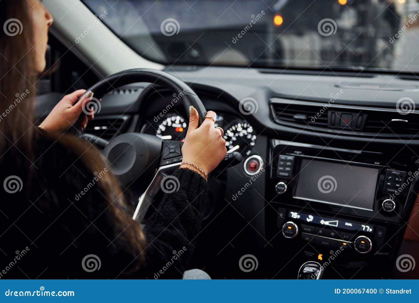 Rear View of Brunette Female Driver that Riding Modern Car at Daytime ...