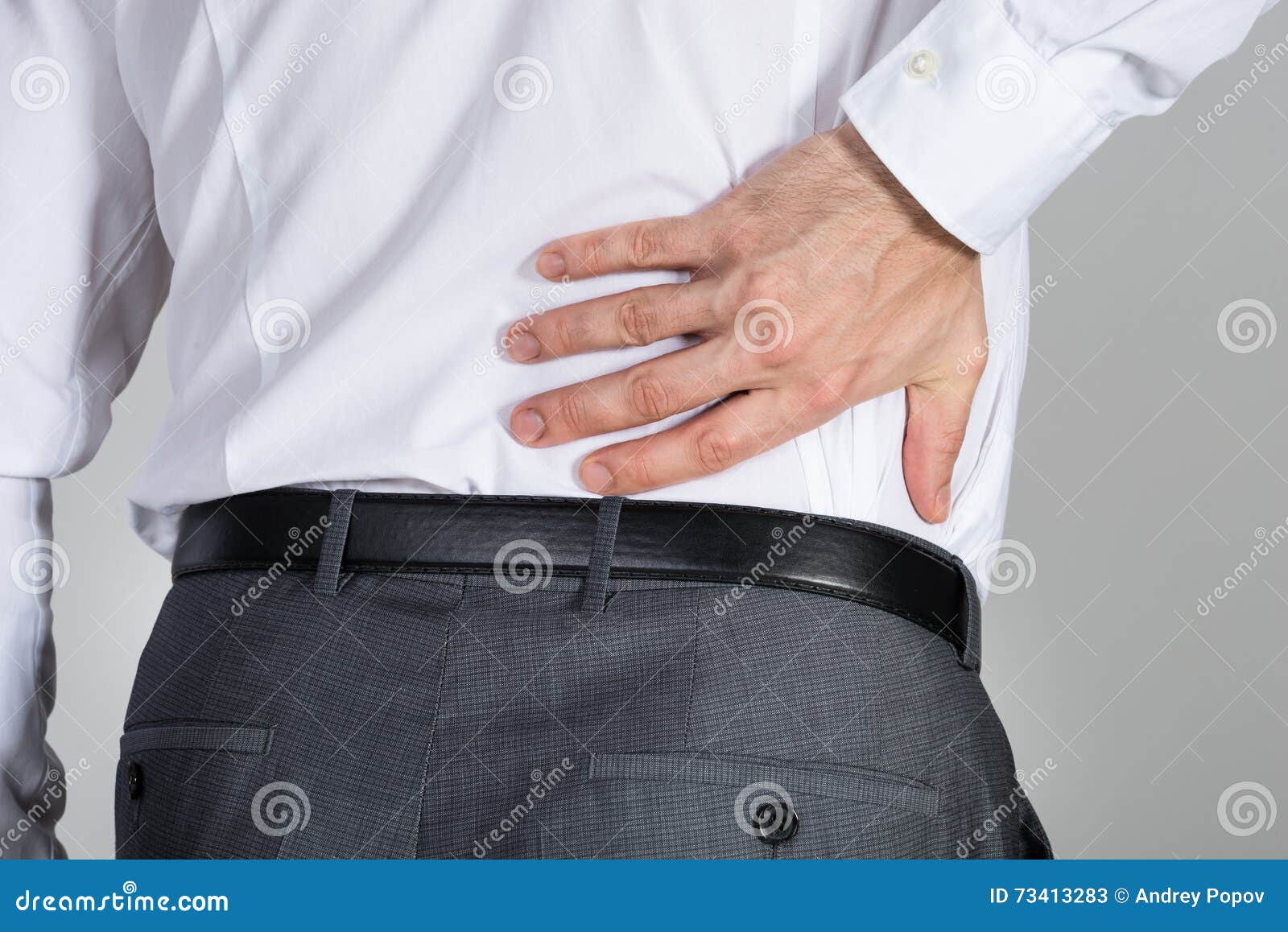 Rear View of Businessman Suffering from Back Ache Stock Image - Image ...