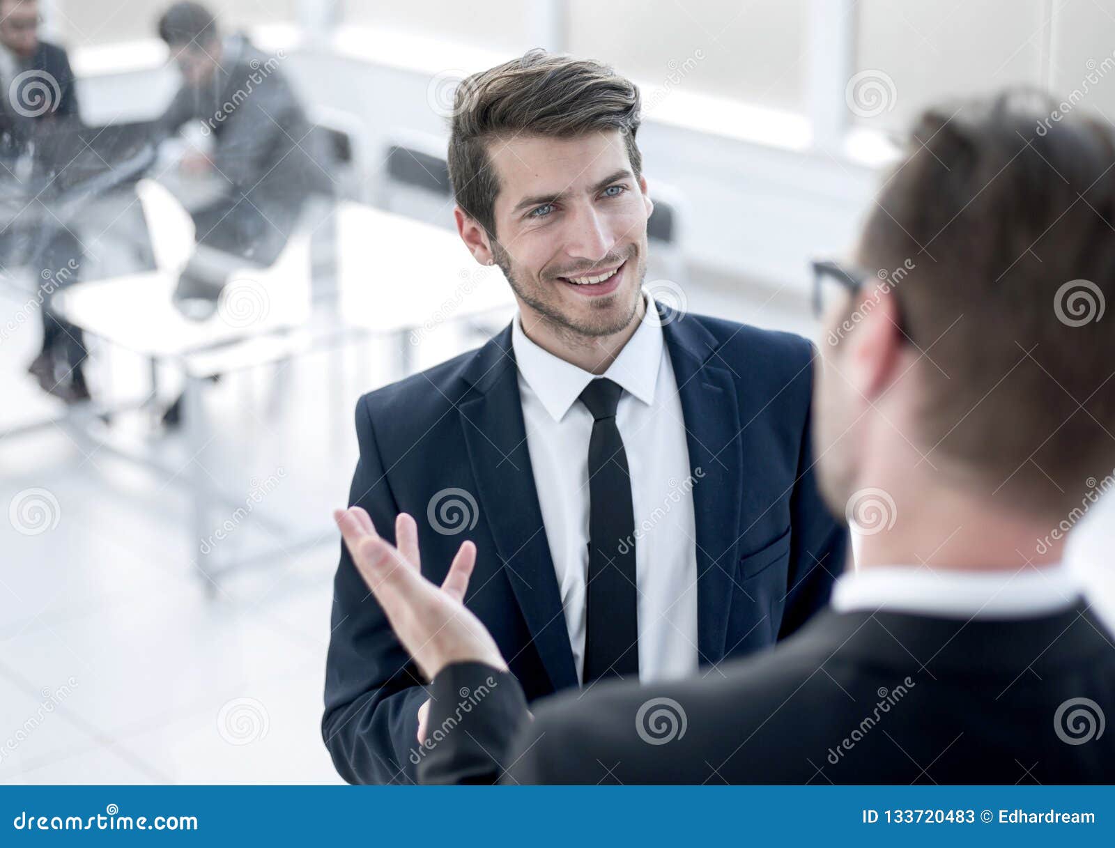 Rear View.businessman Talking To His Partner Stock Image - Image of ... Rear View.businessman Talking To His Partner Stock Image - Image of ...
