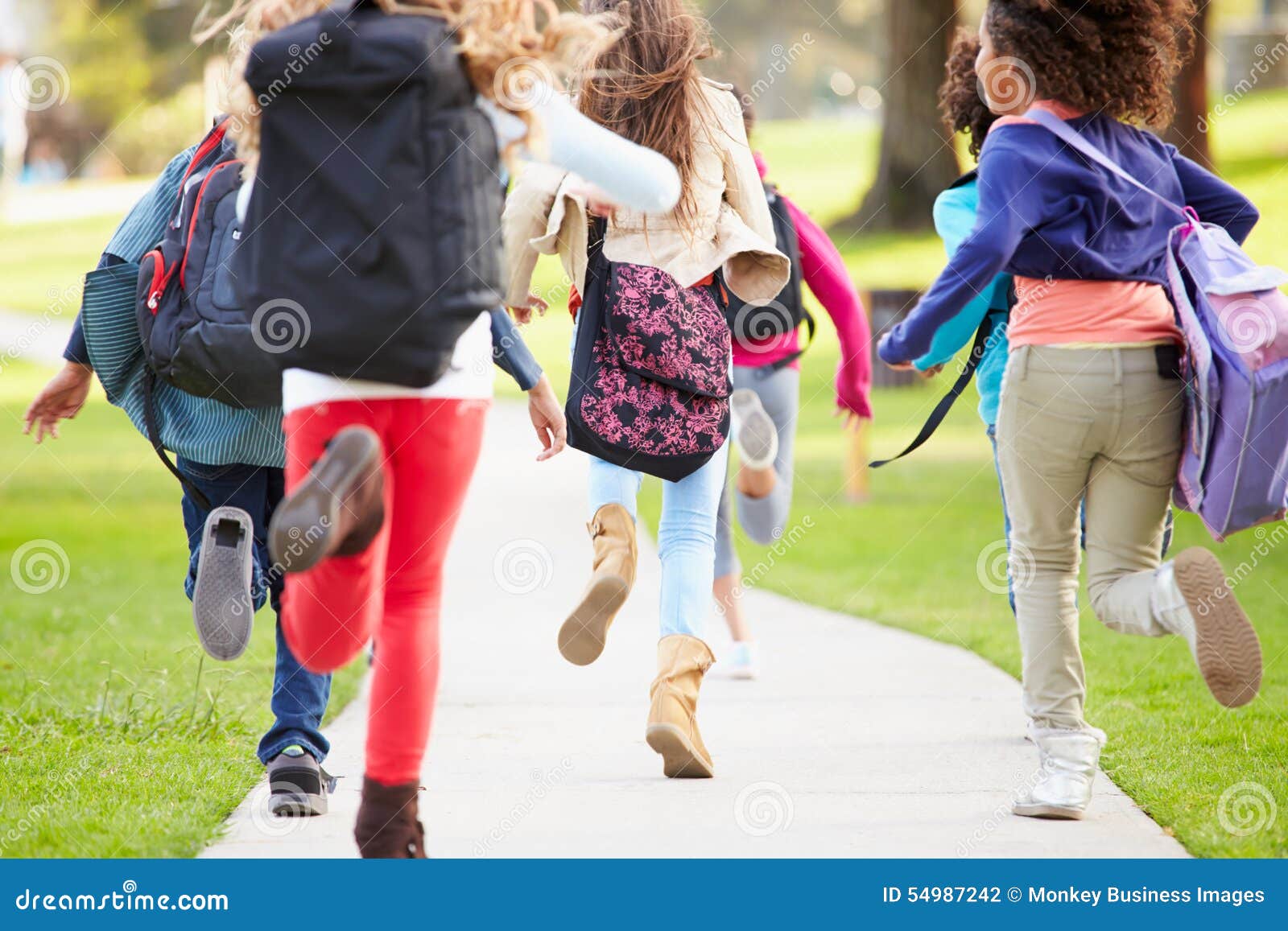 Rear View of Children Running Along Path in Park Stock Photo - Image of ...