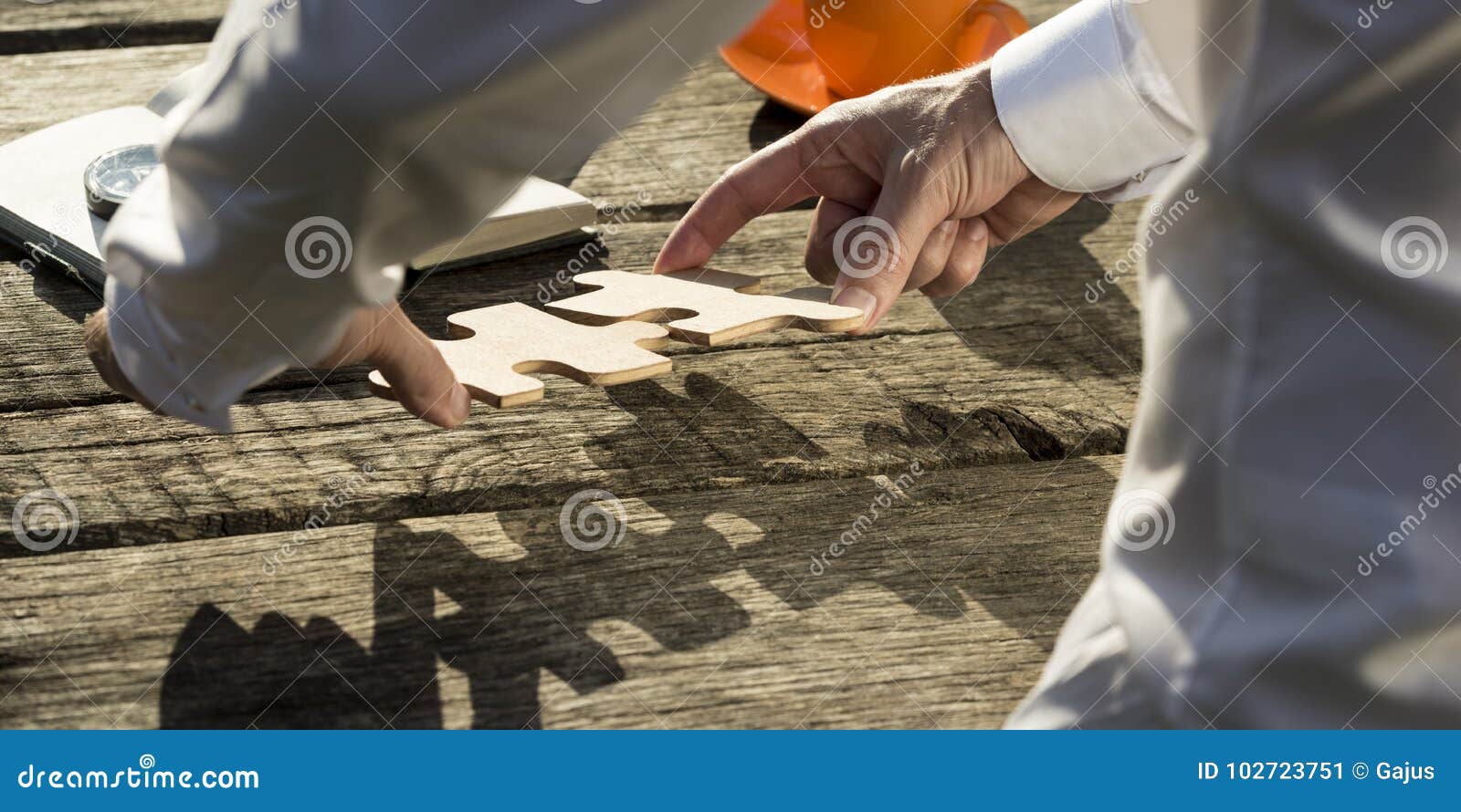 A Man Is Putting Together Blocks With A Red Arrow Chart. Build A ...