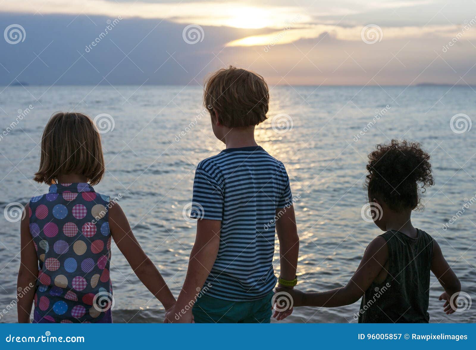 Rear View of Diverse Kids Standing at the Beach Together Stock Image ...
