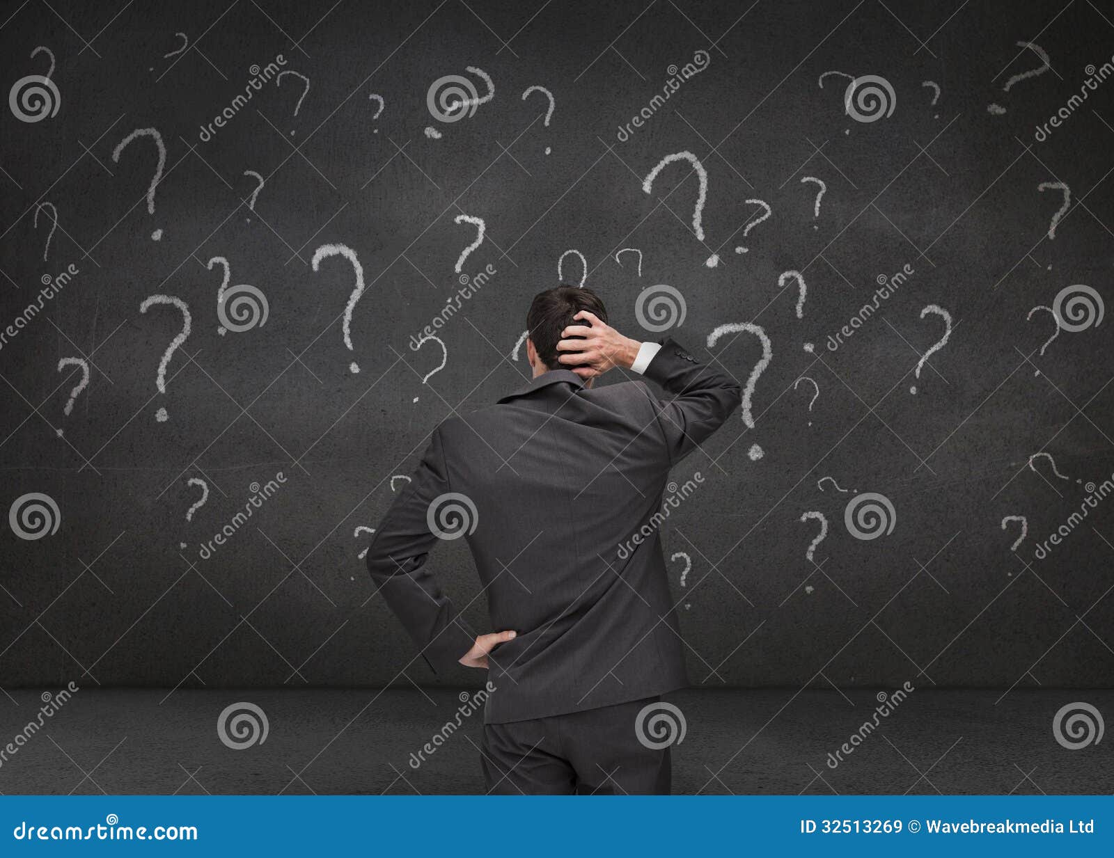 Rear View of a Doubtful Businessman Looking at Various Question Stock ...