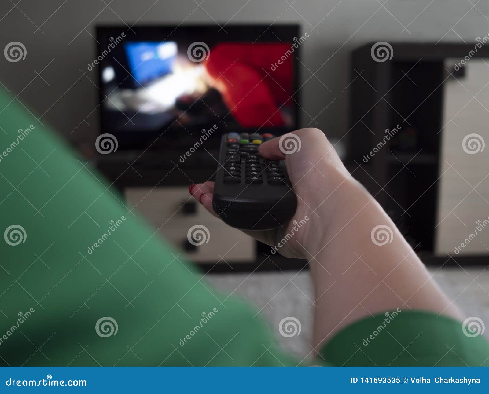 Rear View of a Female Hand Holding a TV Remote Stock Image - Image of ...