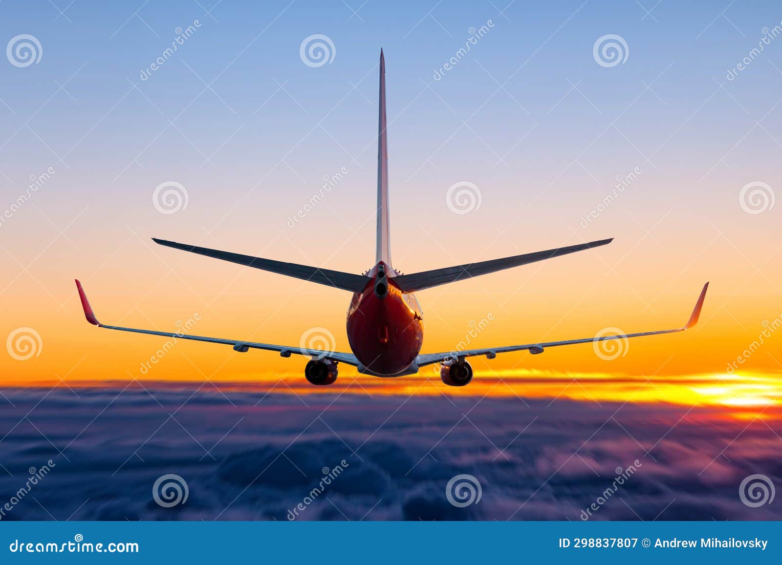 Rear View of a Flying Passenger Jetliner in the Sunset Sky Stock Image ...