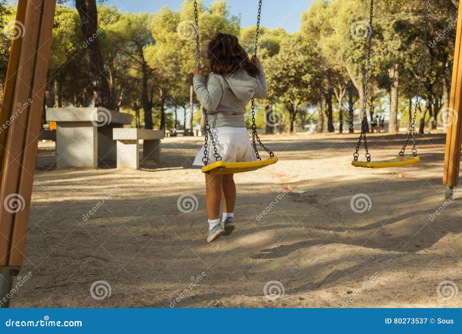 Rear View Girl Having Fun on Swing at the Playground Stock Image ...