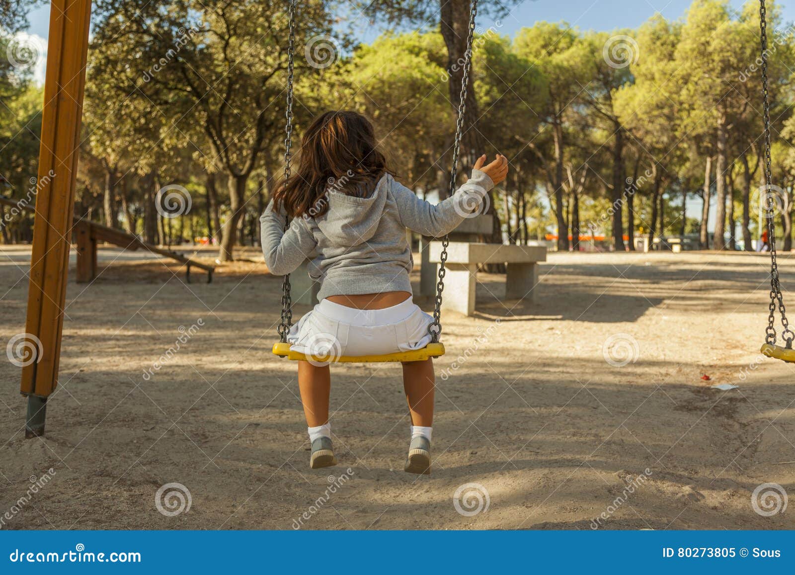 Rear View Girl Having Fun on Swing at the Playground Stock Image ...