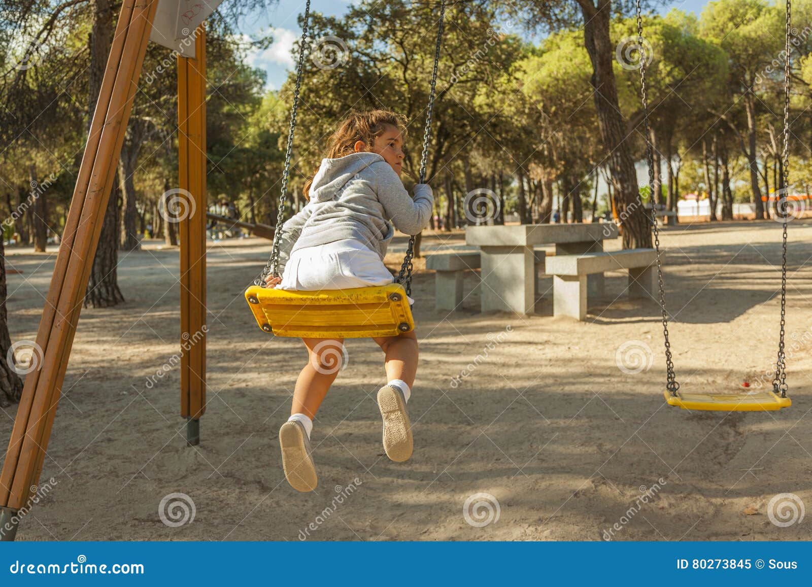 Rear View Girl Having Fun on Swing at the Playground Stock Image ...
